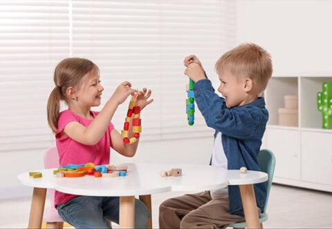 How to Teach Sharing by Age: A Guide for Parents - Begin Learning